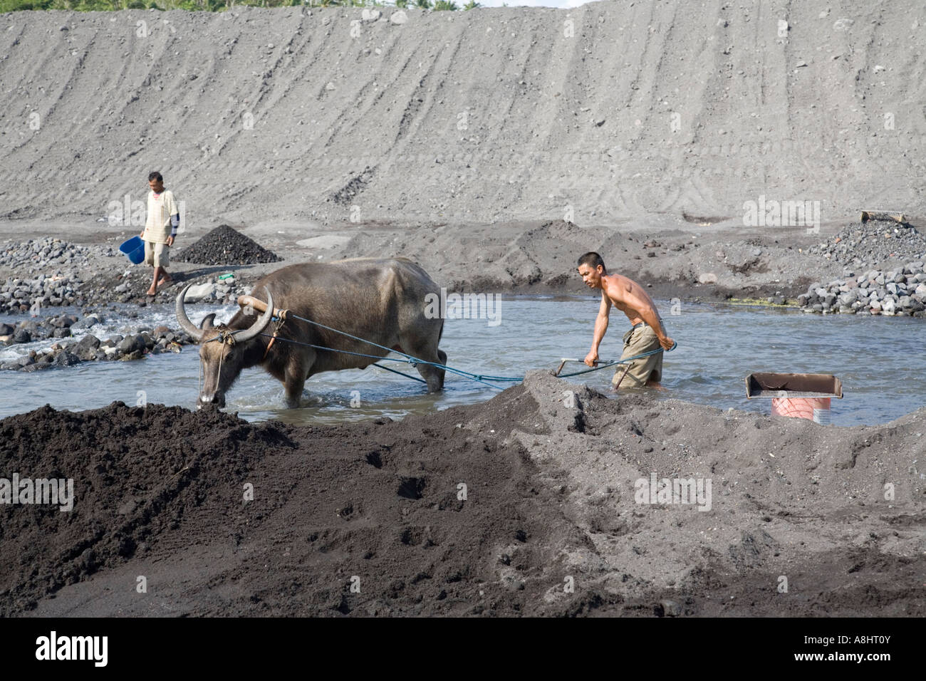 Clearing ashes after volcanic eruption hi-res stock photography and ...
