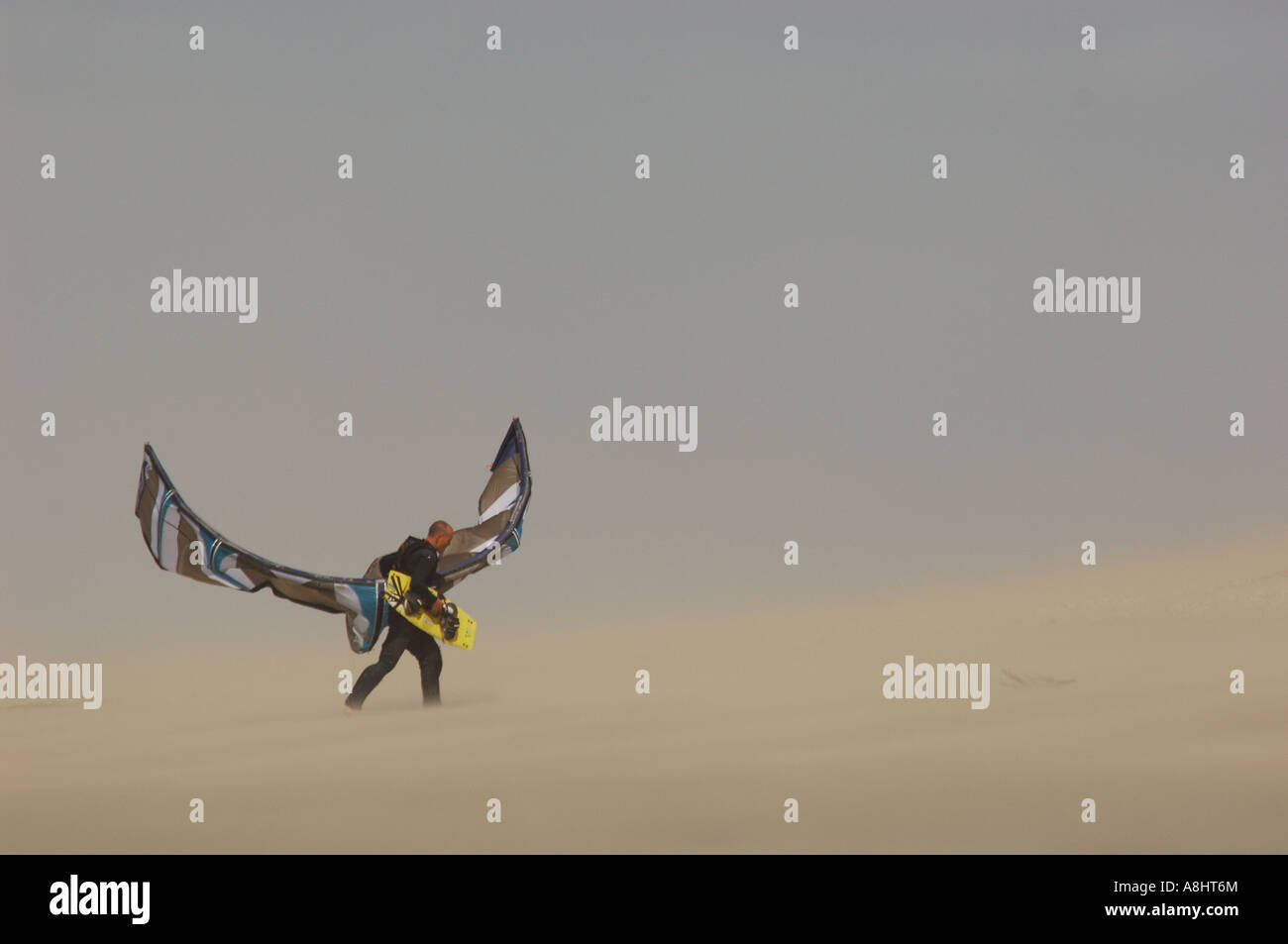 Kite boy is speaking with child on the beach Stock Photo - Alamy