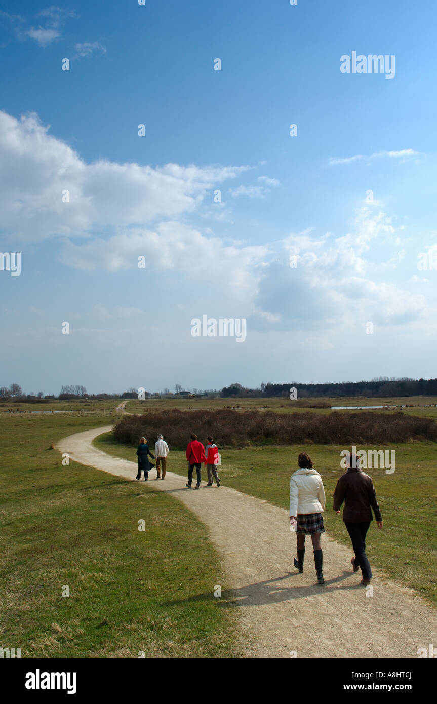 Walking people on a shell track pad place the dunes Sealand with a bleu ...