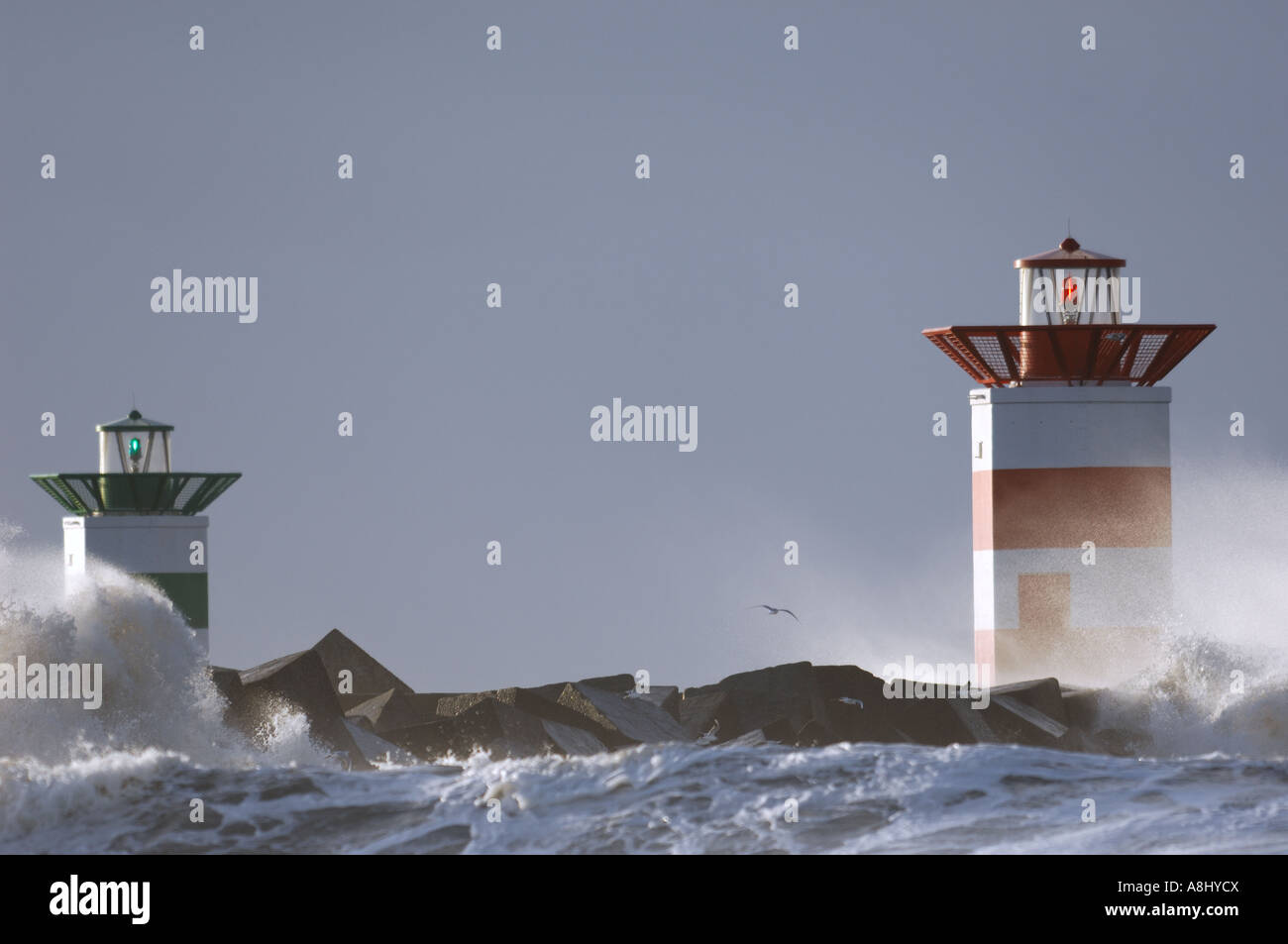Storm in Scheveningen at the coast of Holland on the jetty whit ...