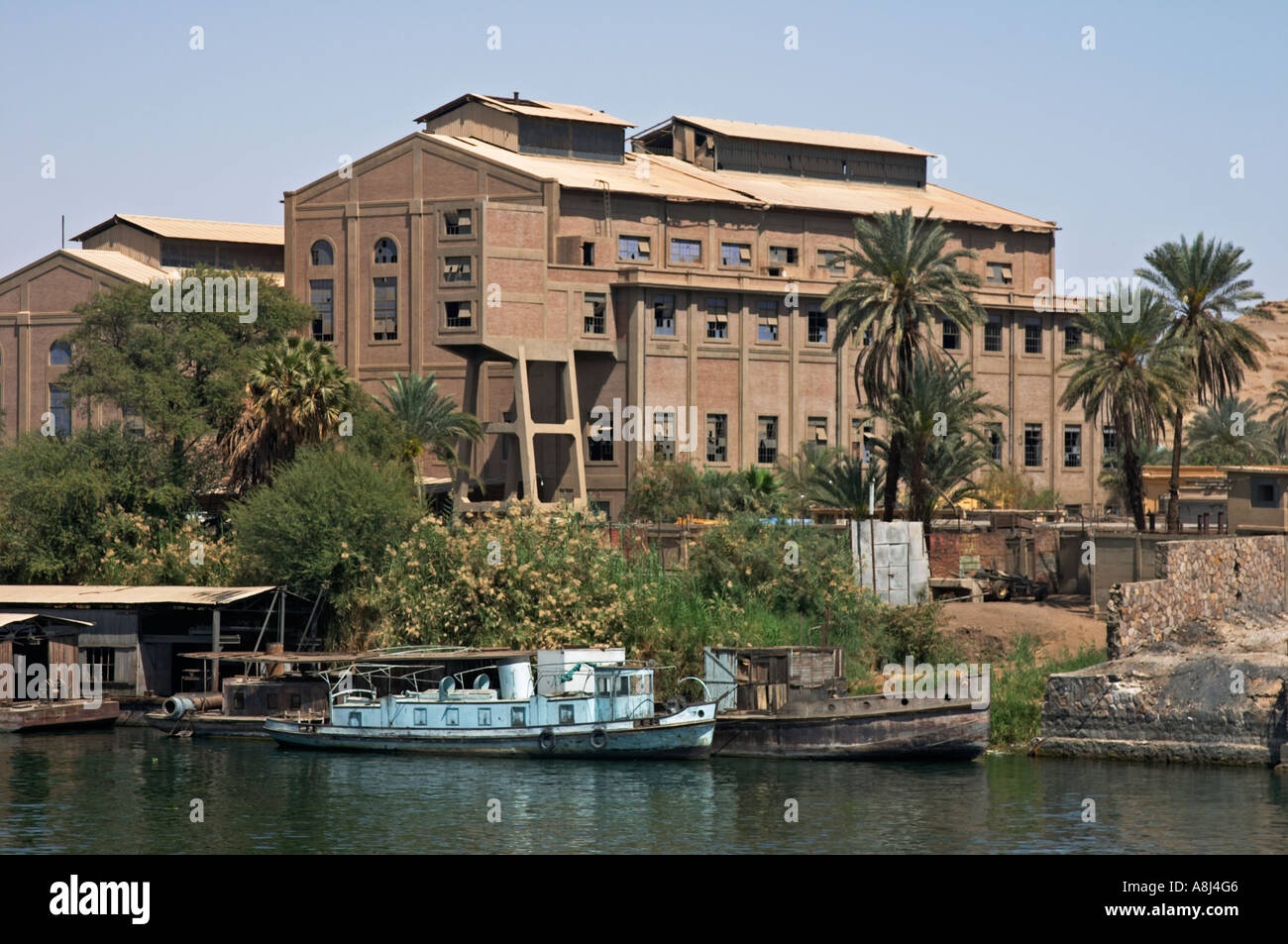 Factory on the River Nile Stock Photo - Alamy