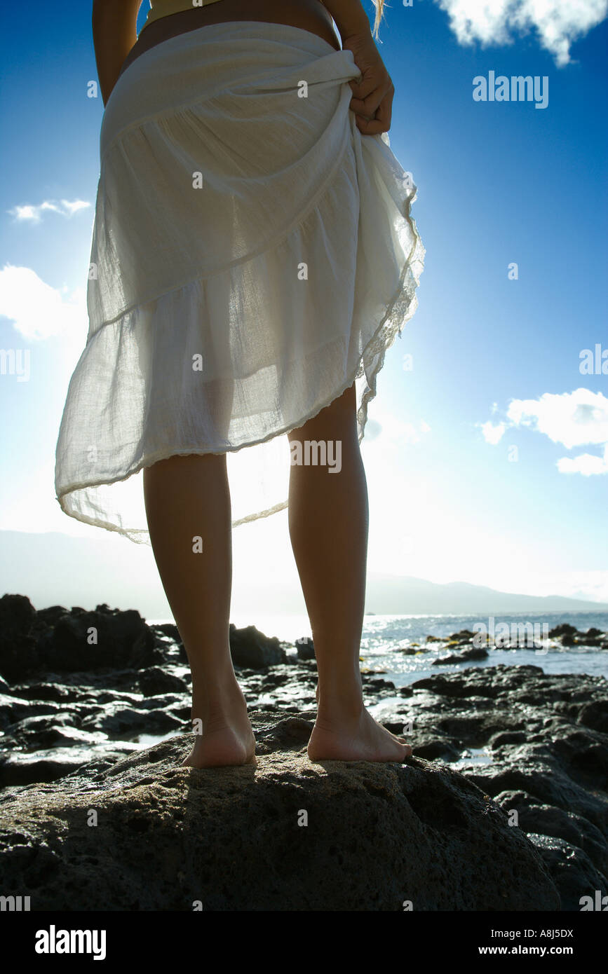 Filipino woman standing on rocky beach hi-res stock photography and ...