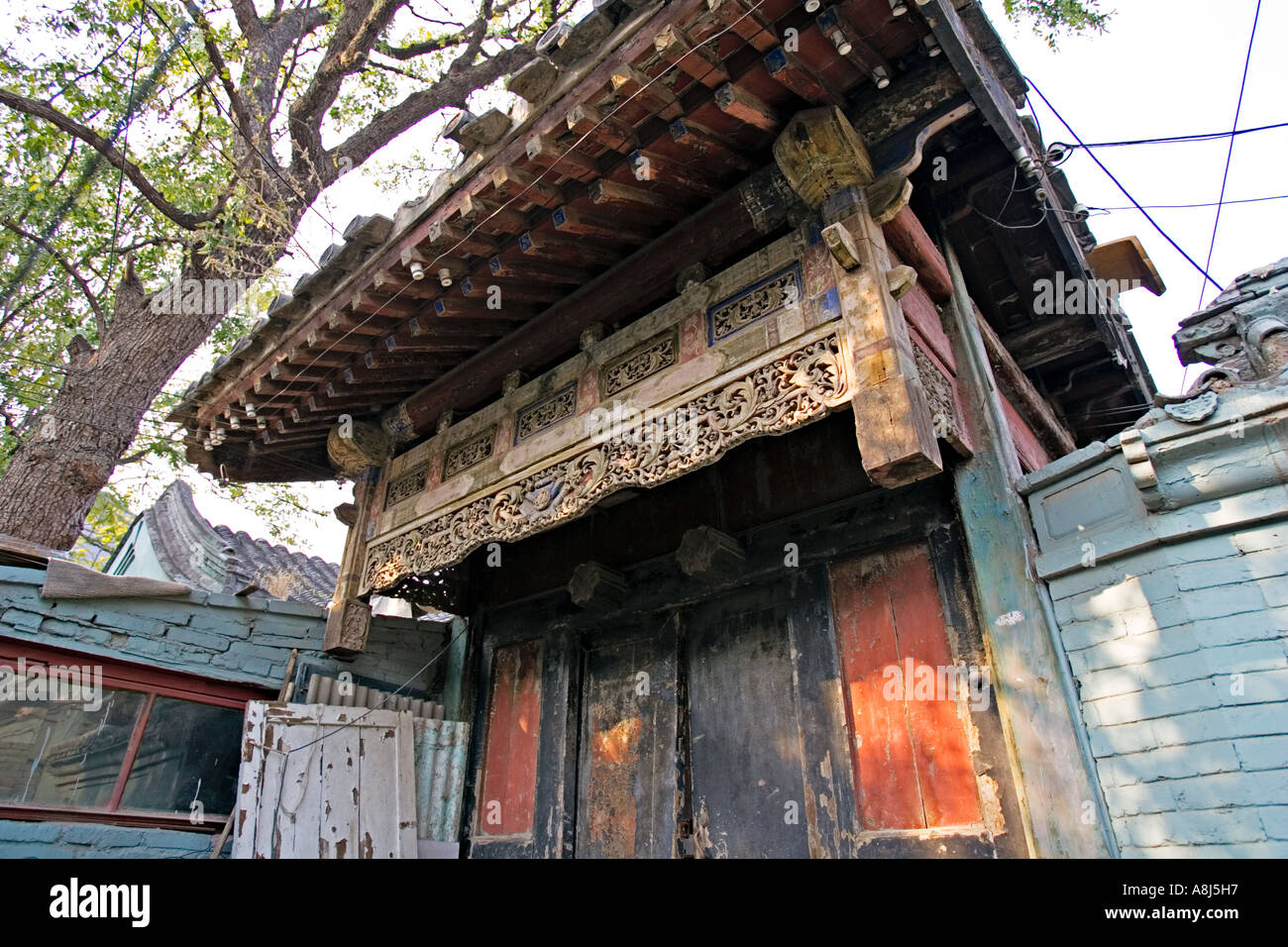 CHINA BEIJING Doorway into traditional hutong house with elaborately ...