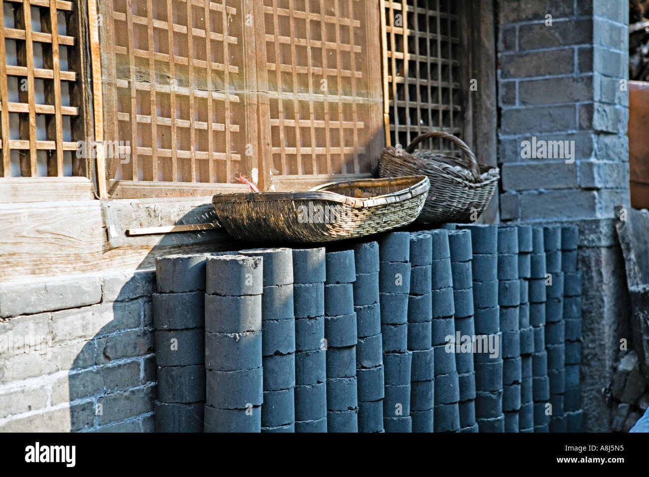 CHINA Chuandixia Briquettes of compressed coal used for fuel stacked in ...