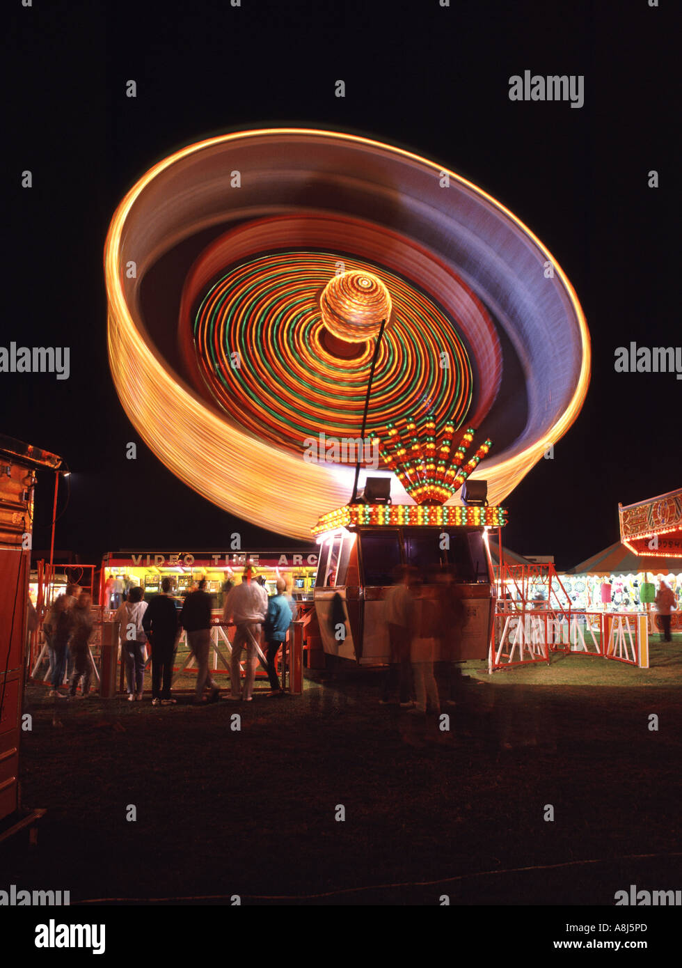 Fairground ride at night time Stock Photo - Alamy