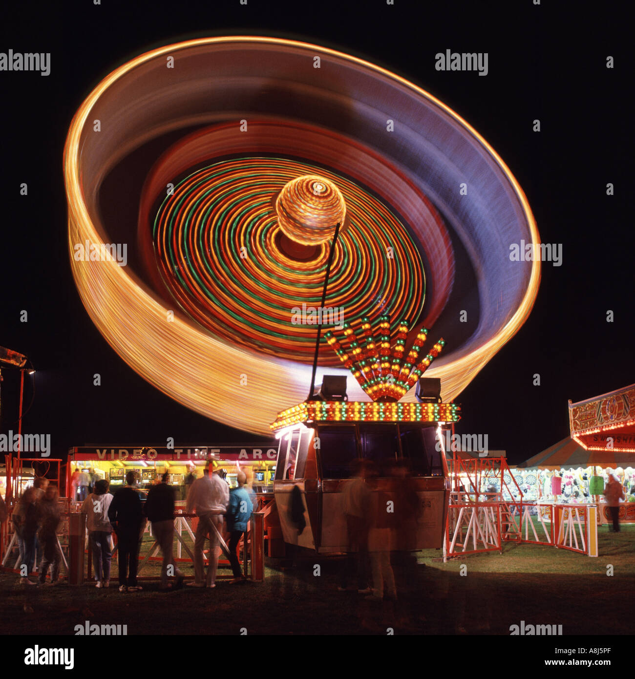 Fairground ride at night time Stock Photo - Alamy