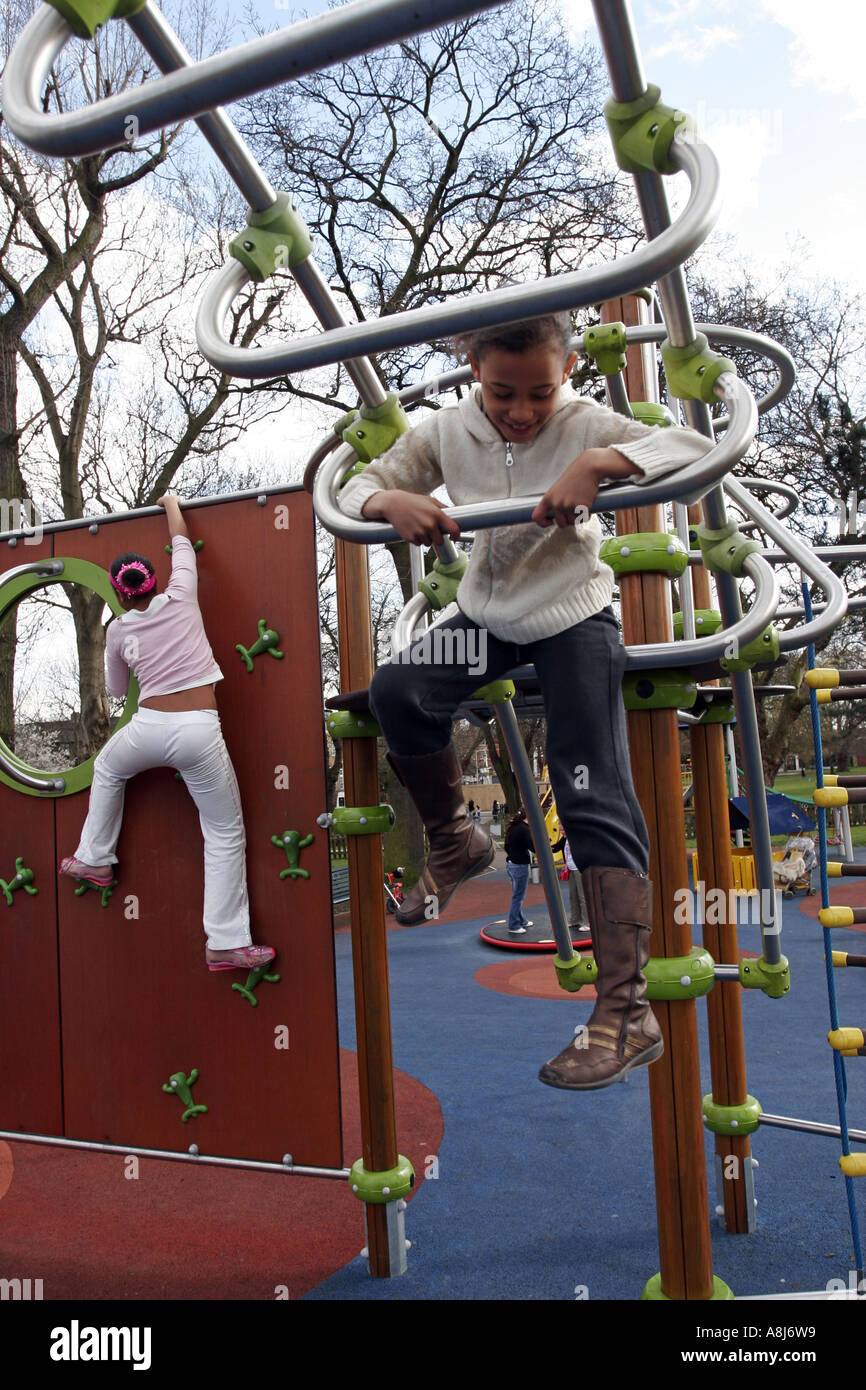 UNITED KINGDOM WEST LONDON ACTON CHILDREN PLAYING IN PLAYGROUND Stock ...