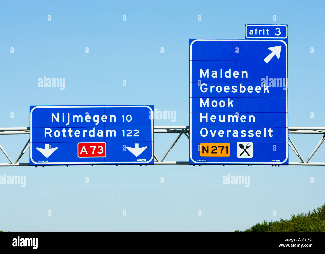 Dutch motorway signs on an overhead gantry showing routes, The ...