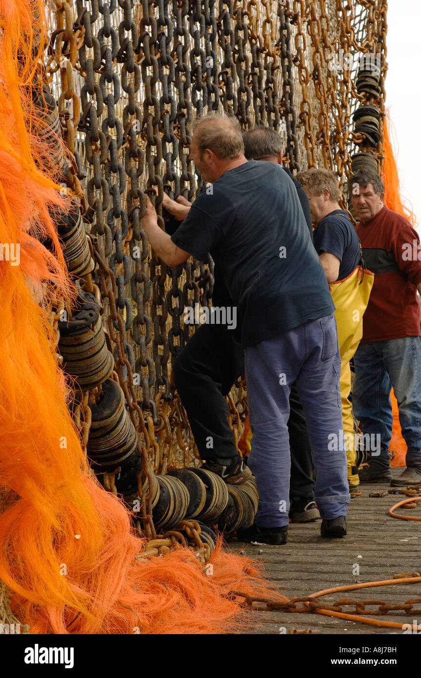 Fisher men at work with cuting torch oxyacetylence burner in the ...