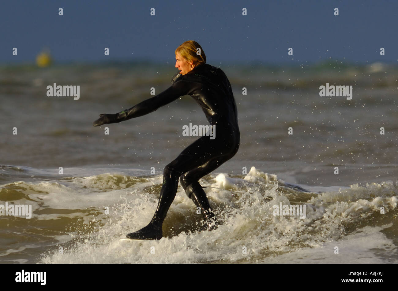 wave surfing 2006 city place Scheveningen beach Zuid Holland gold light ...