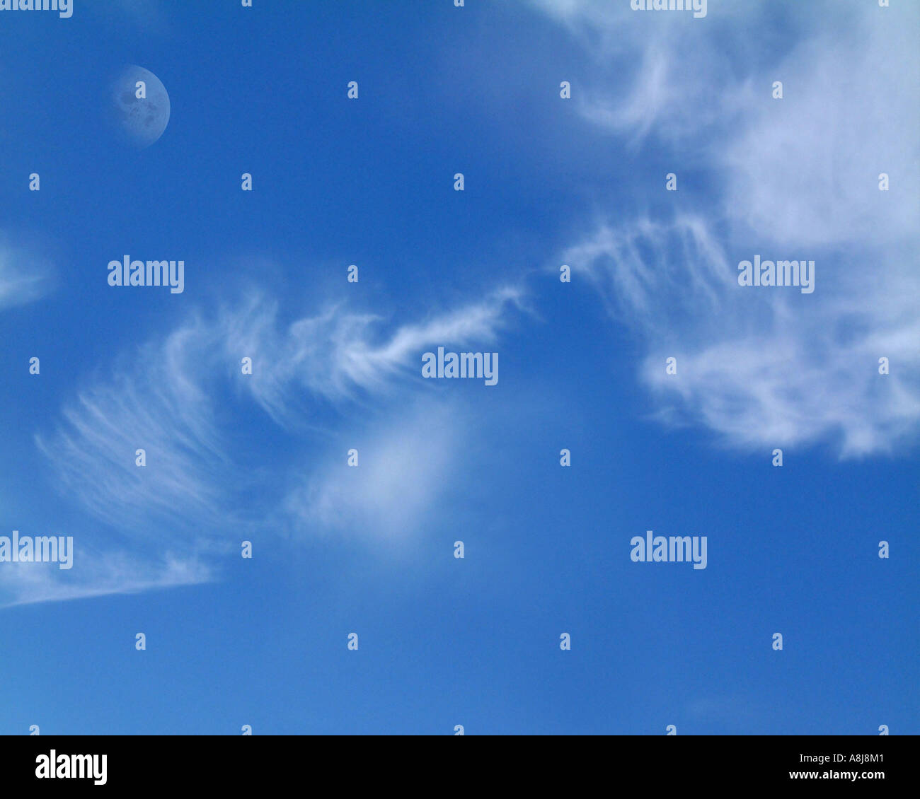Blue sky with cloud formation moon hi-res stock photography and images ...