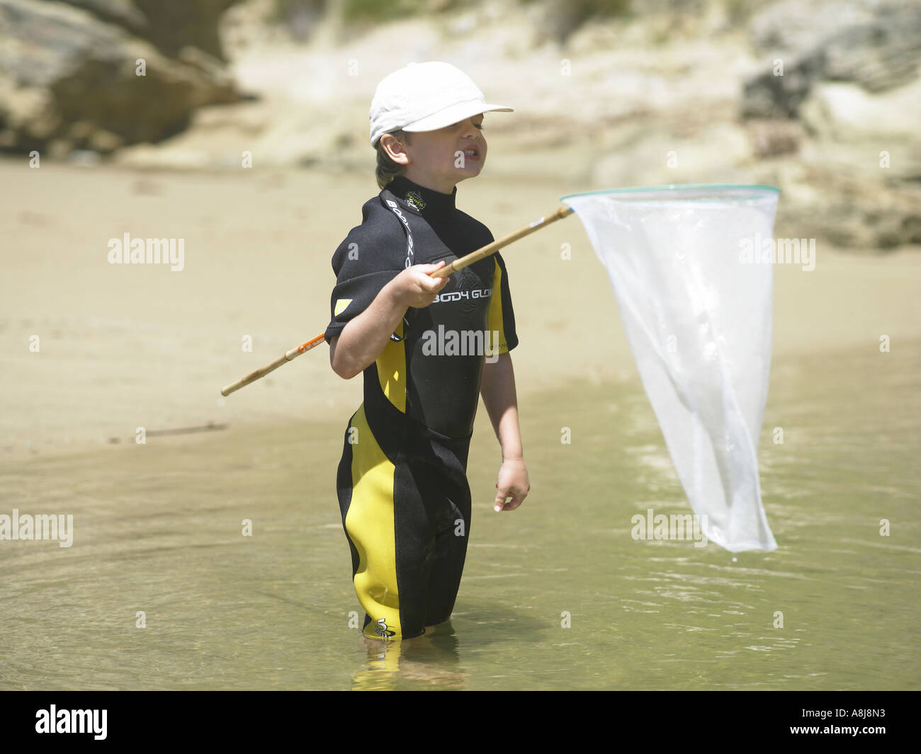 Children netting fish hi-res stock photography and images - Alamy