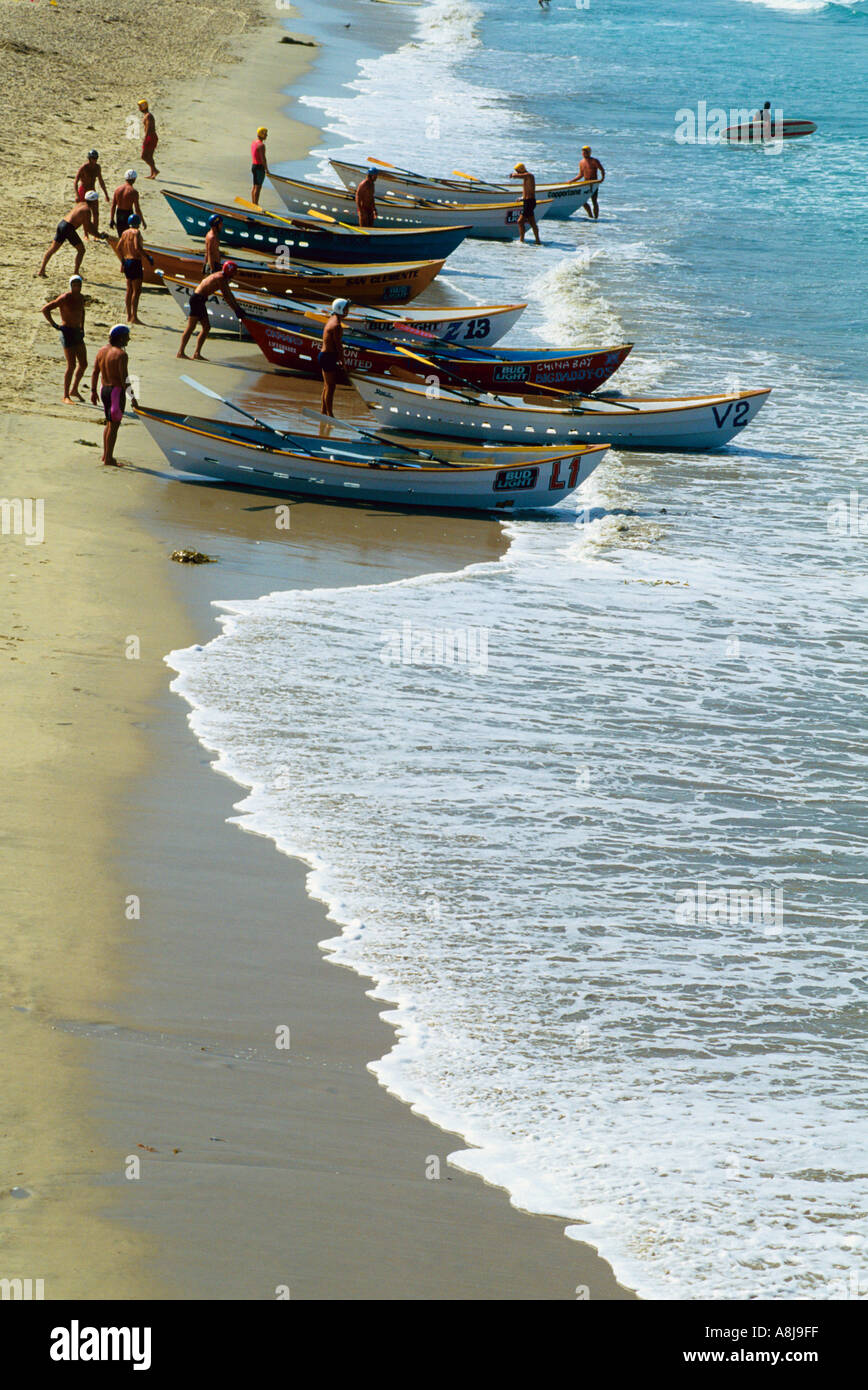 lifeguard dory racing boats Stock Photo - Alamy