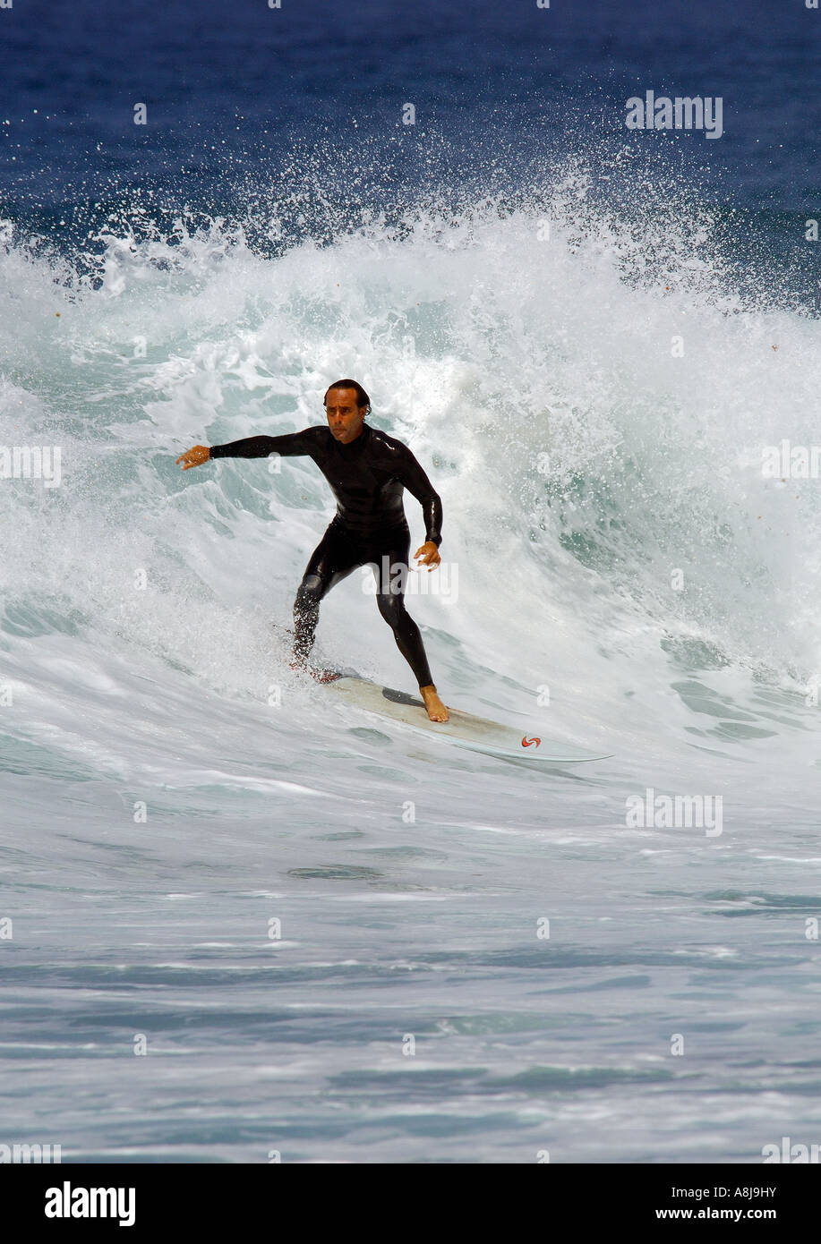 Surfer Diving Under Wave High Resolution Stock Photography and Images ...