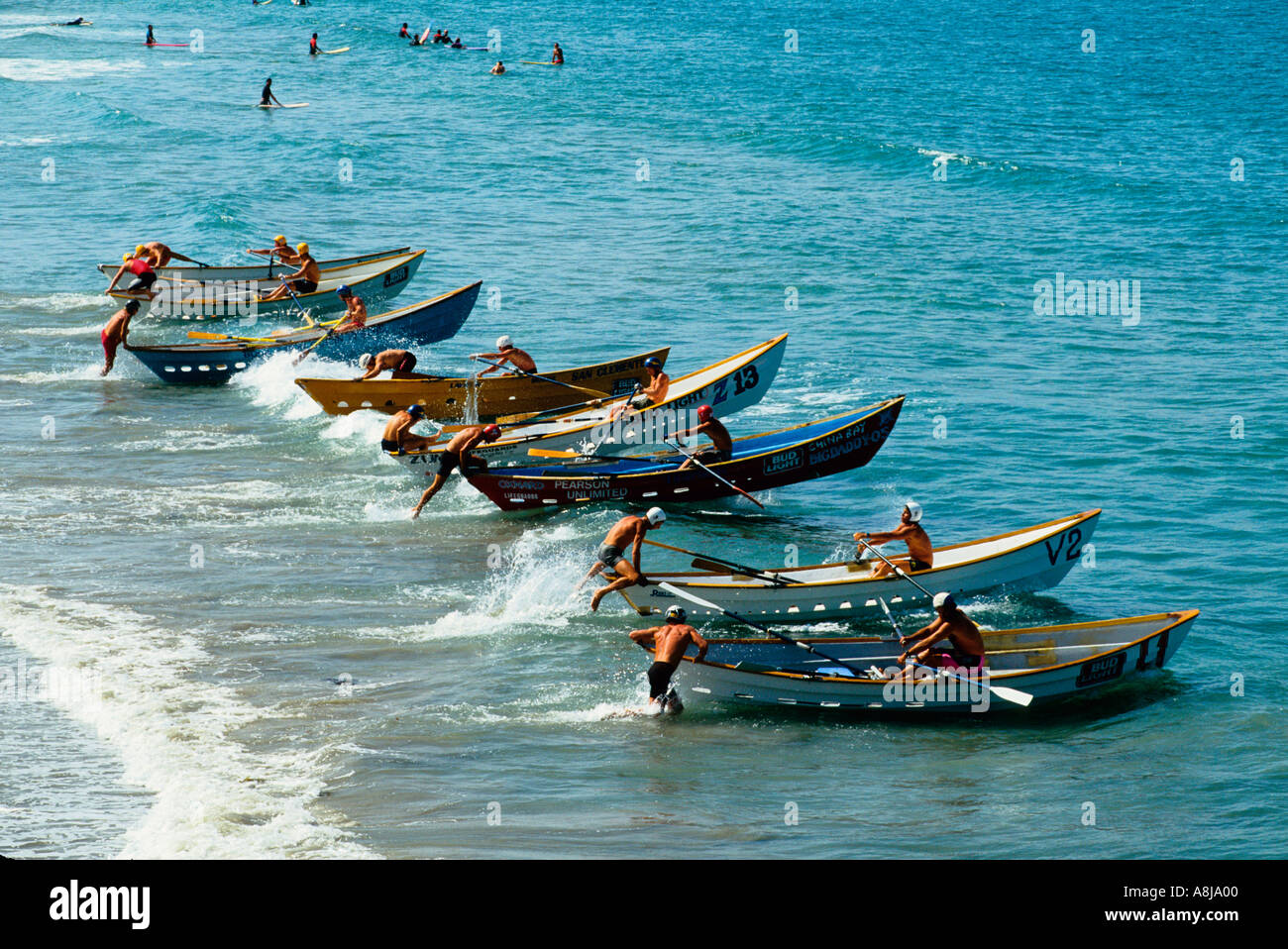 lifeguard dory racing boats Stock Photo - Alamy