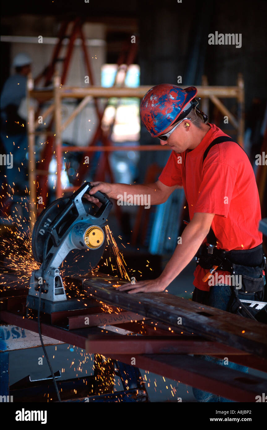 Construction worker cutting steel Stock Photo - Alamy