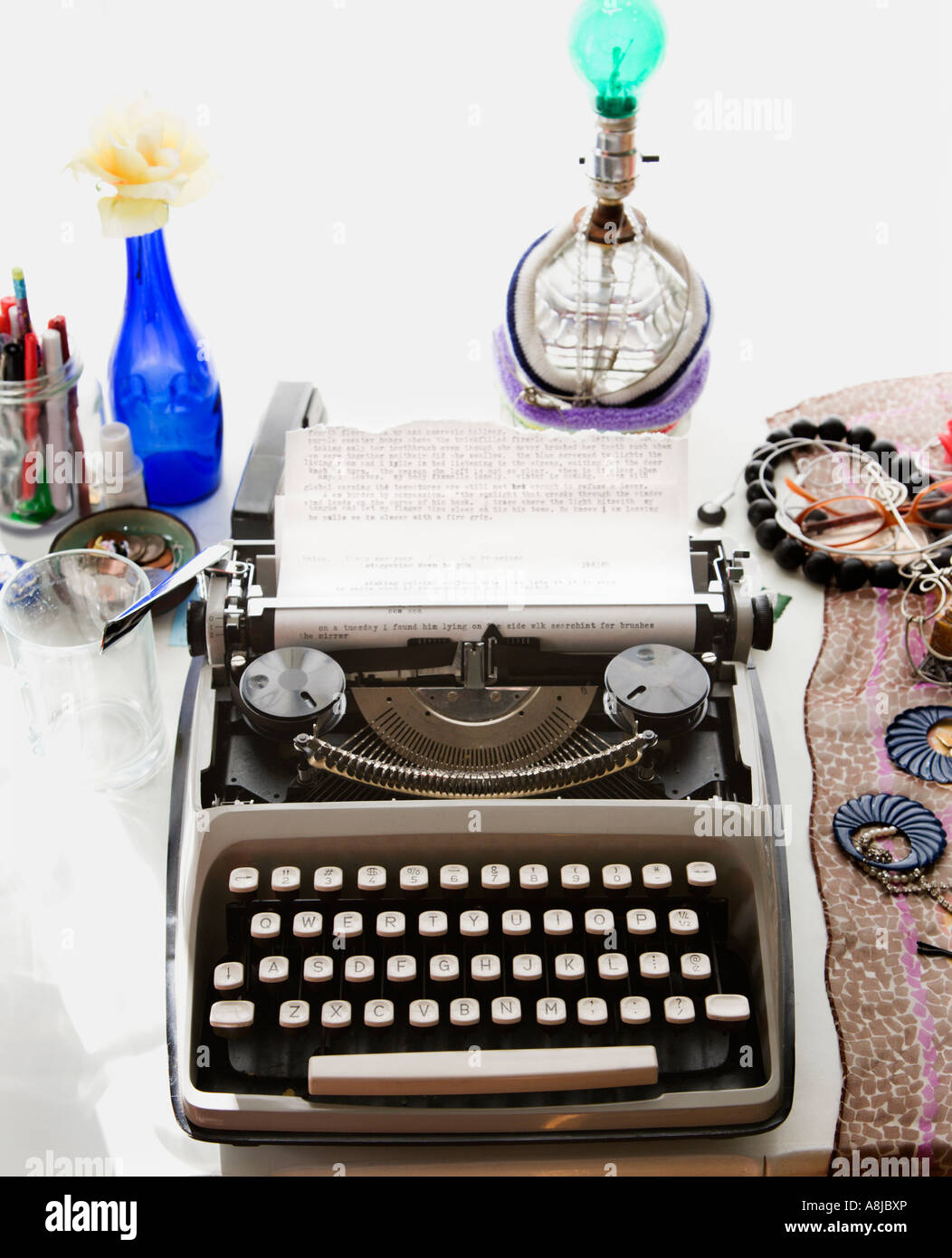 Typewriter with typed on paper sitting on counter Stock Photo - Alamy