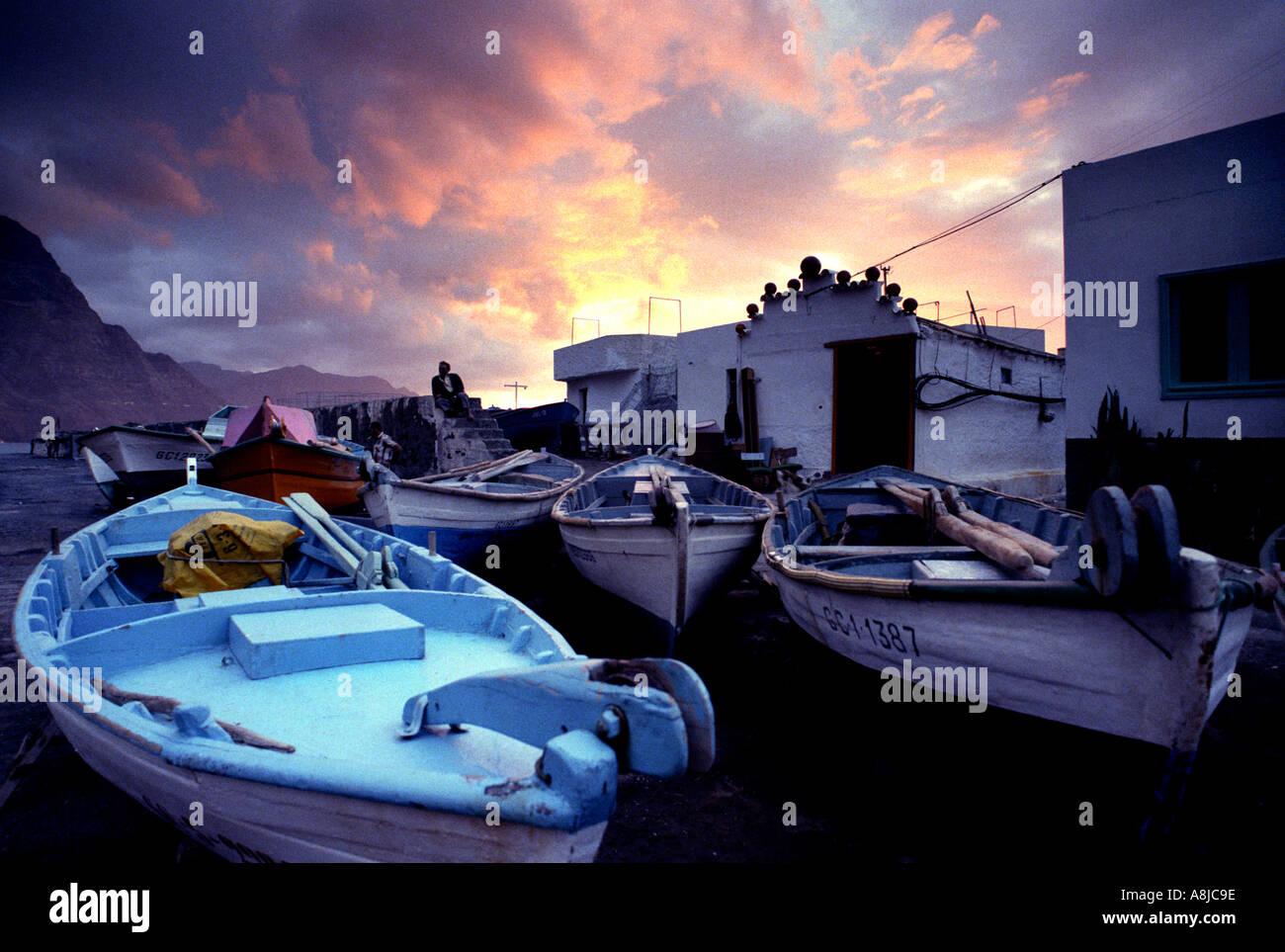 Gran Canaria 1990s Sunset over the old part of historic fishing village ...