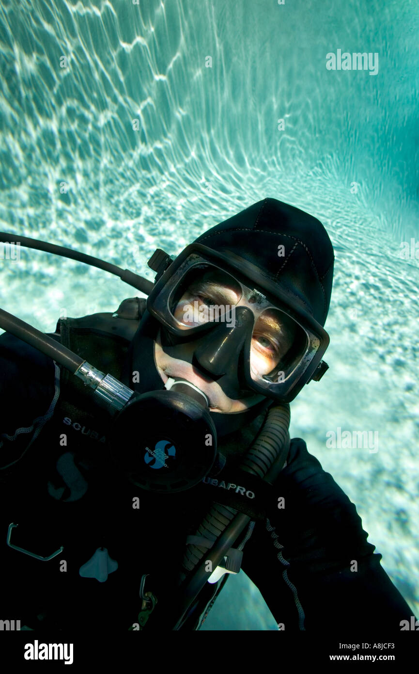 Diver in cold water gear Stock Photo - Alamy