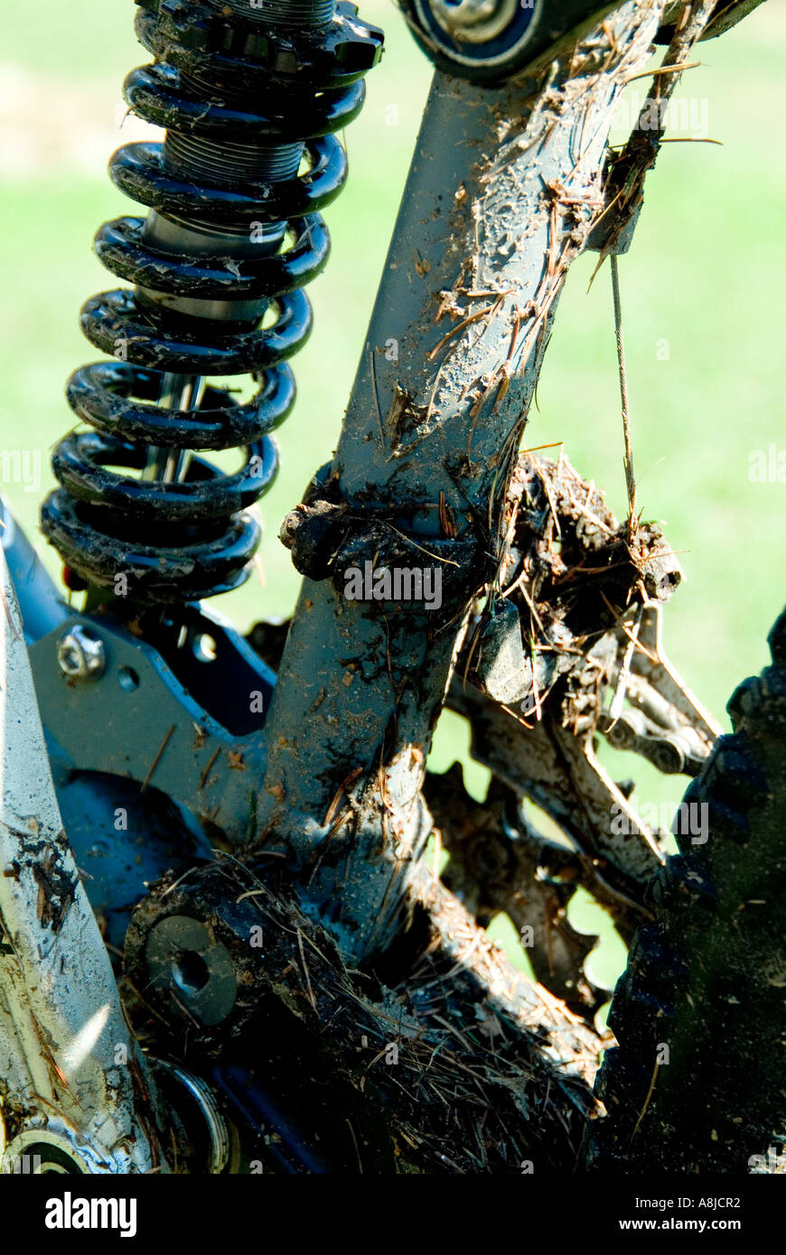 detail of a rear suspension of a mountain bike after an excursion Stock ...