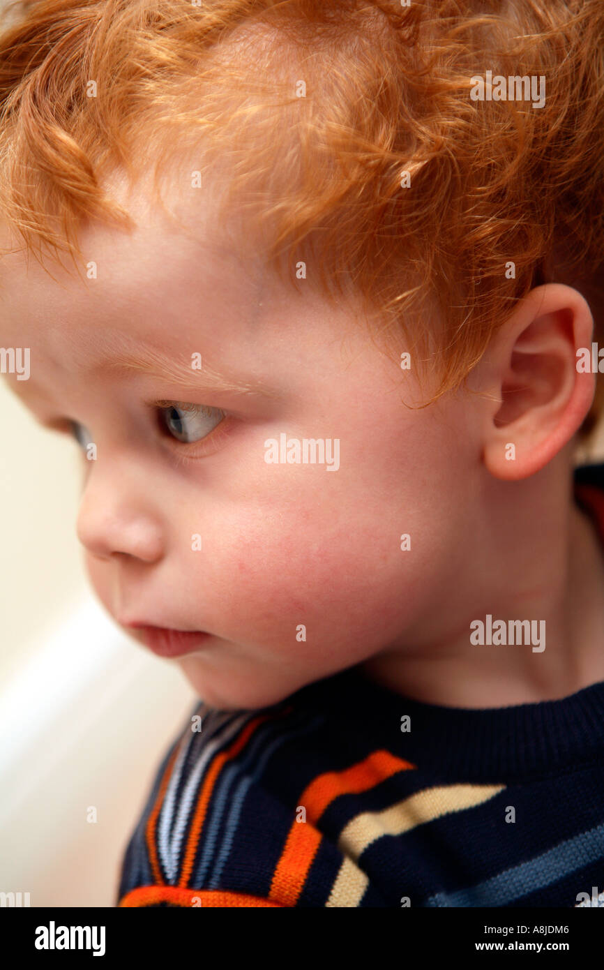 The face of a toddler with red hair Stock Photo - Alamy