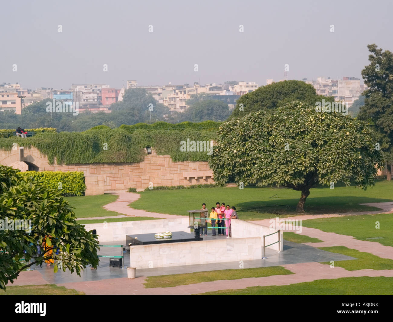 Raj Ghat Memorial to Mahatma Gandhi with Asian families paying their ...