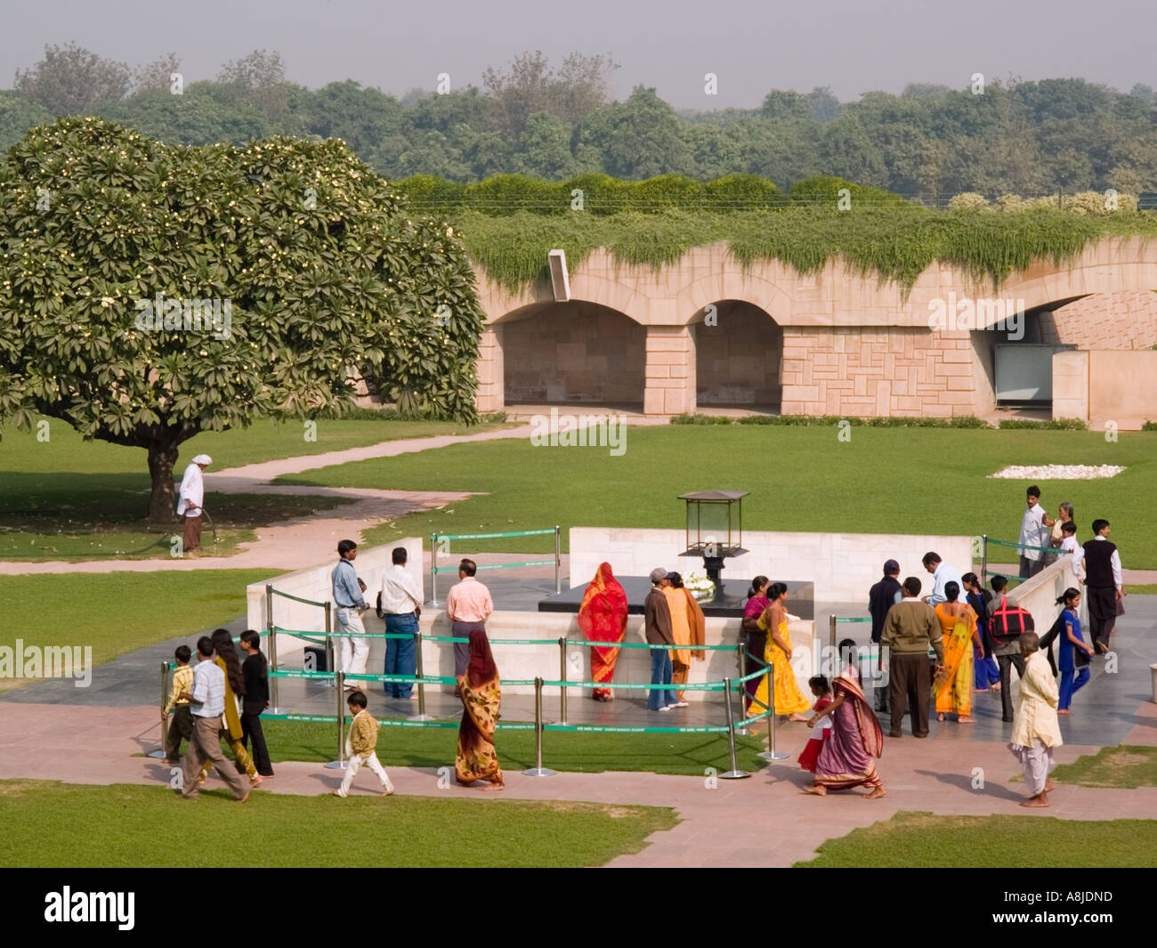 Raj Ghat Memorial to Mahatma Gandhi with Asian families paying their ...