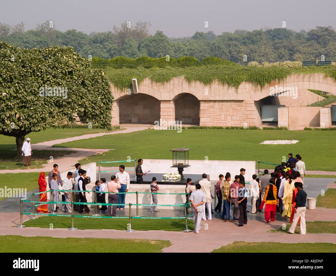 Raj Ghat Memorial to Mahatma Gandhi with Asian families paying their ...