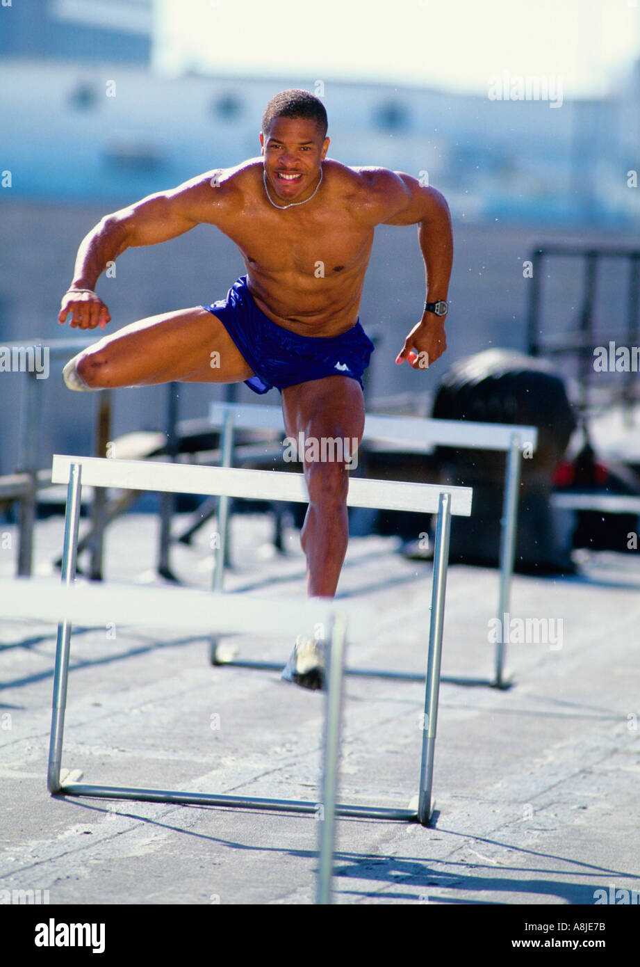 Racing over hurdles hi-res stock photography and images - Alamy