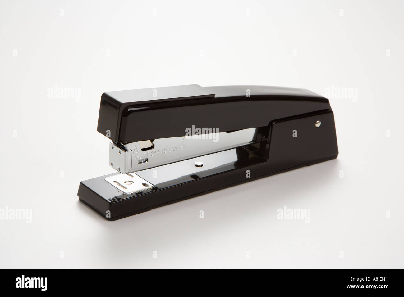 Black stapler on white background Stock Photo - Alamy