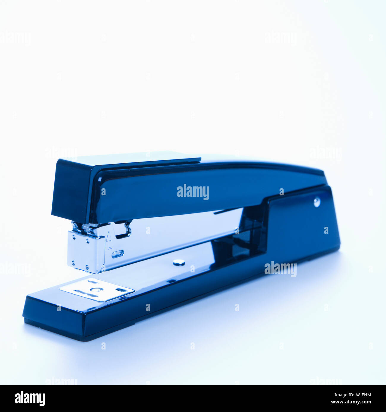 Blue stapler on white background Stock Photo - Alamy