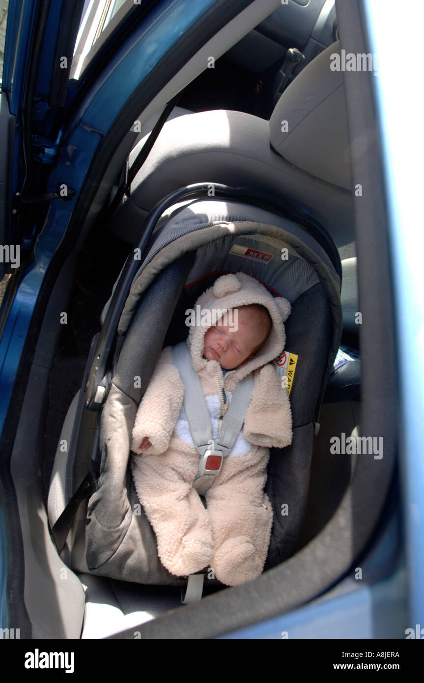 Baby in car seat Stock Photo - Alamy