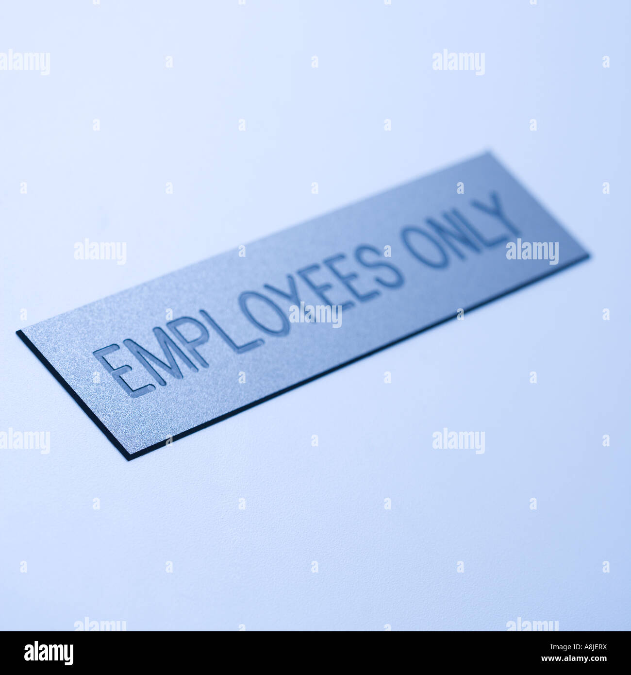 Blue employees only sign Stock Photo - Alamy