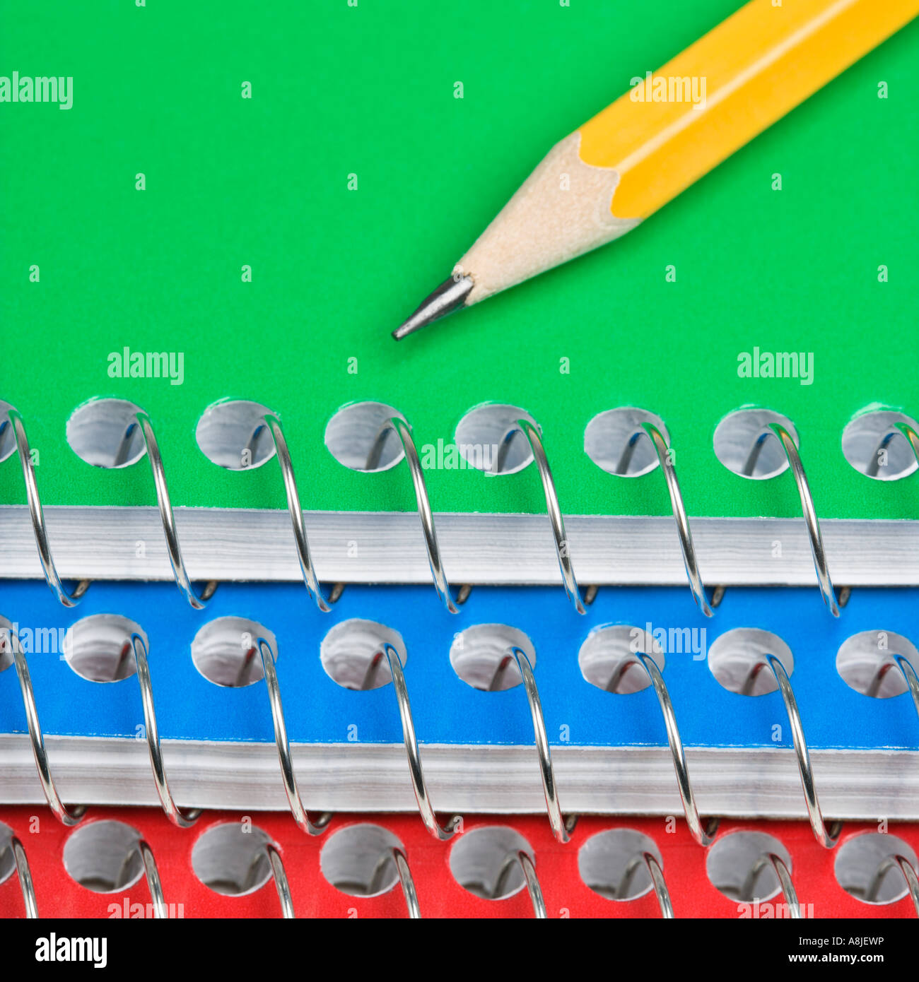 Pile of notebooks pencil hi-res stock photography and images - Alamy