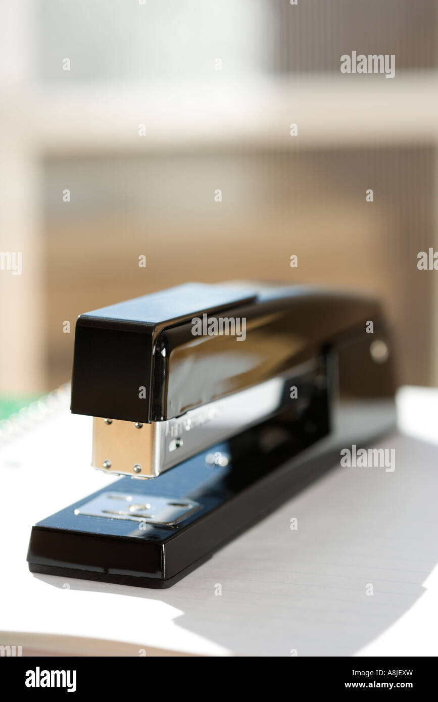 Black stapler with window in background Stock Photo - Alamy