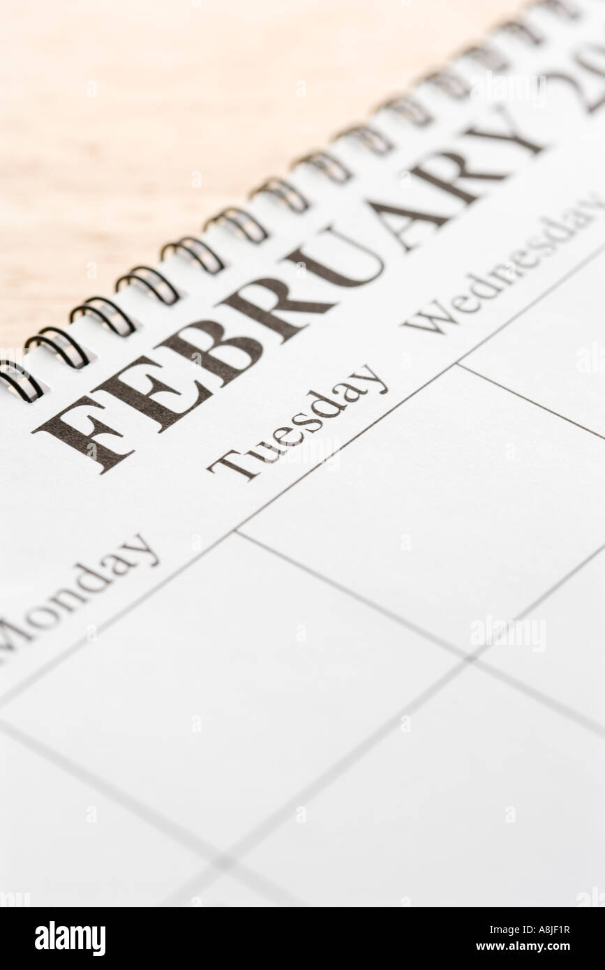 Close up of spiral bound calendar displaying month of February Stock ...