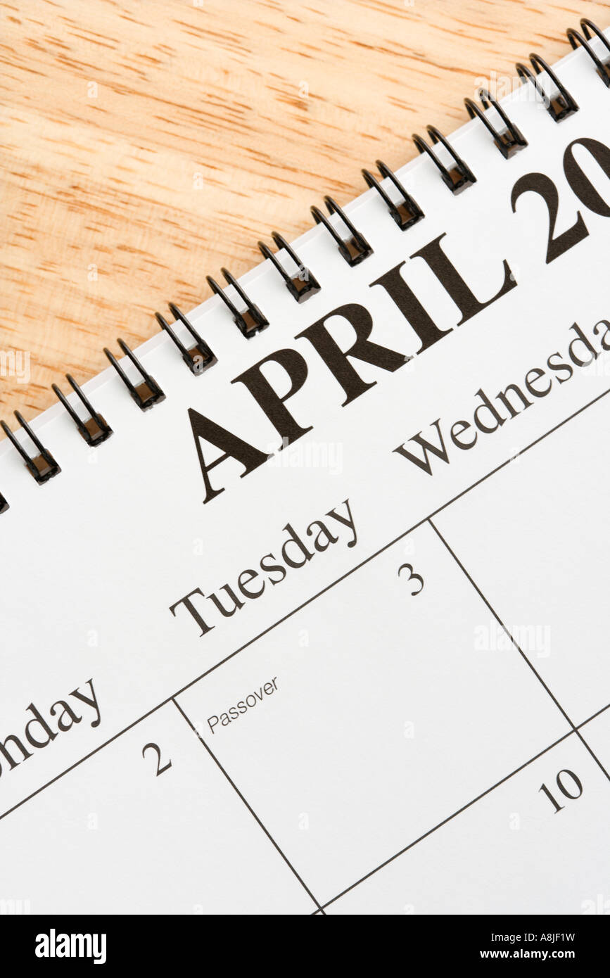 Close up of spiral bound calendar displaying month of April Stock Photo ...