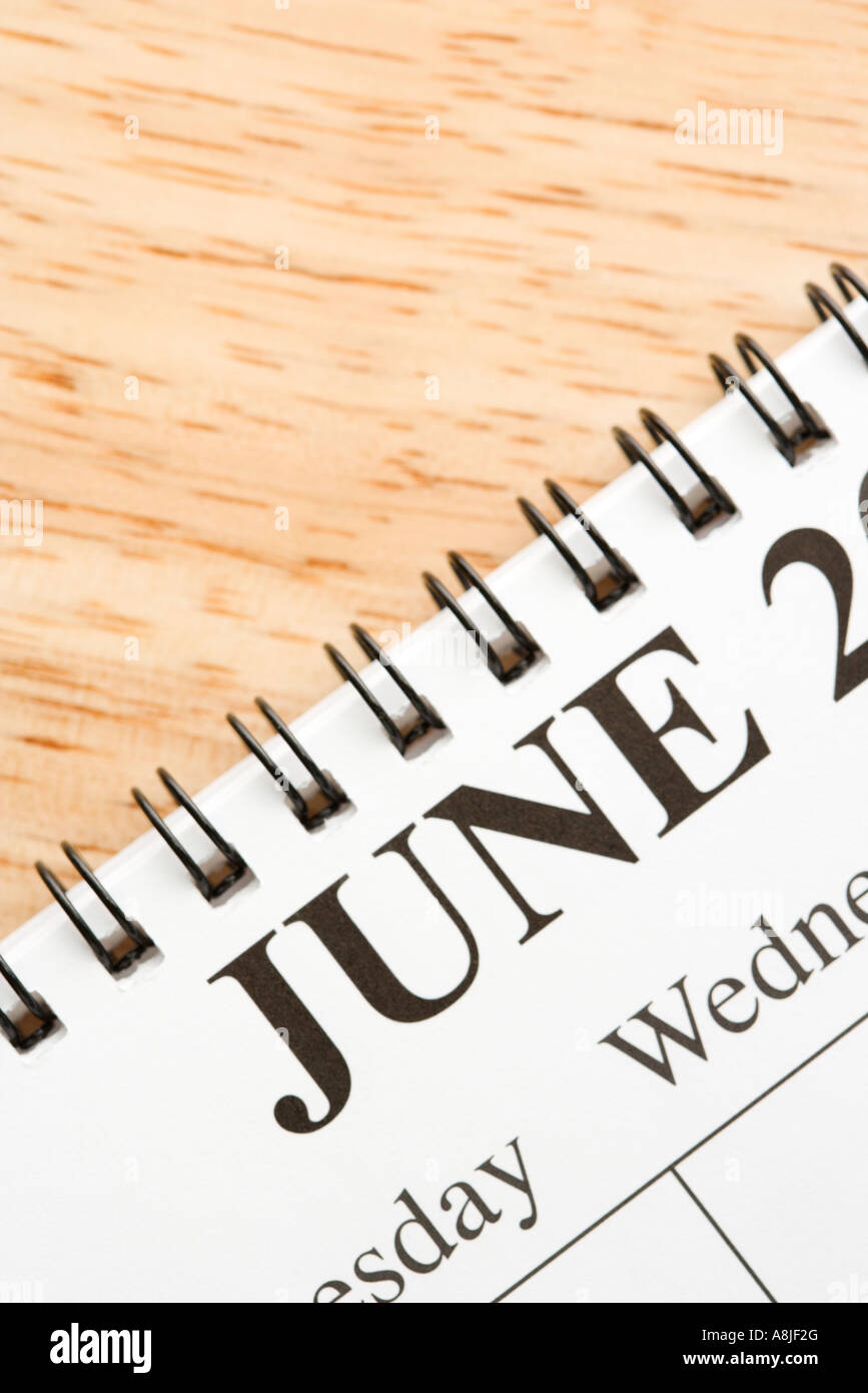 Close up of spiral bound calendar displaying month of June Stock Photo ...