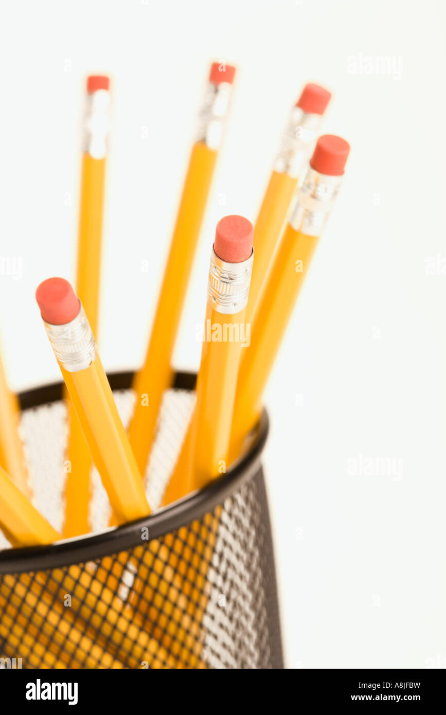 Group of pencils in a pencil holder with eraser ends up Stock Photo - Alamy