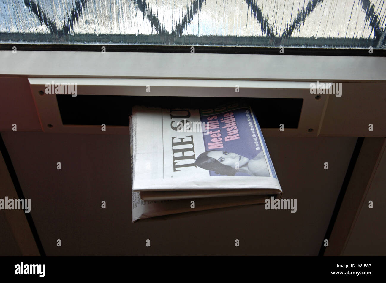 Newspaper letterbox uk hi-res stock photography and images - Alamy