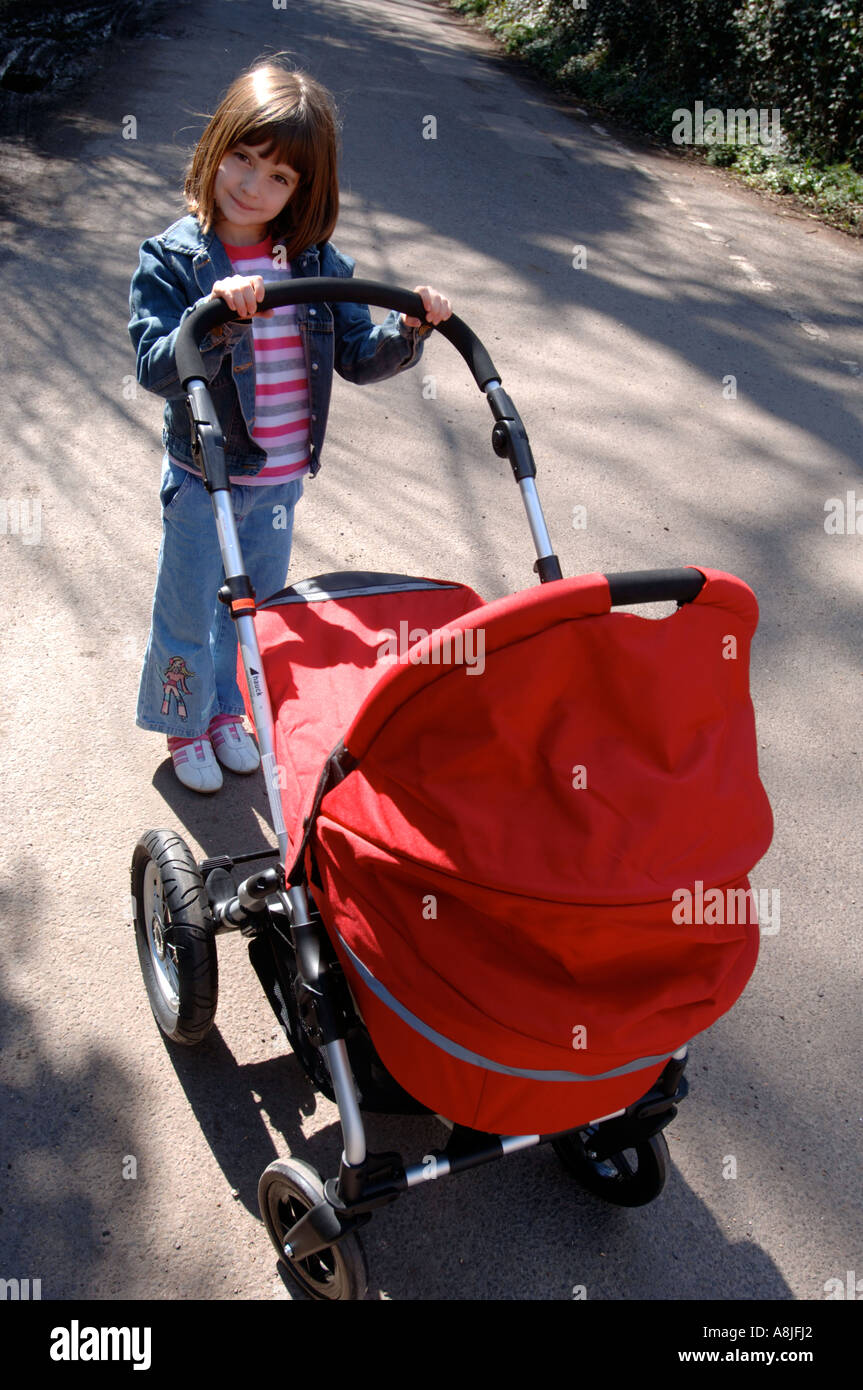 Pushing sibling hi-res stock photography and images - Alamy