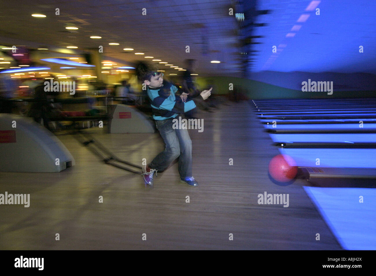 Boy bowling hi-res stock photography and images - Alamy
