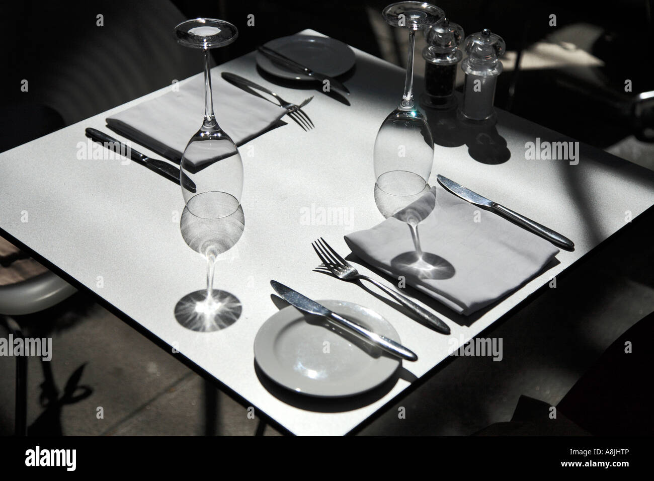 a table set for dinner in an outdoors restaurant in London Stock Photo ...