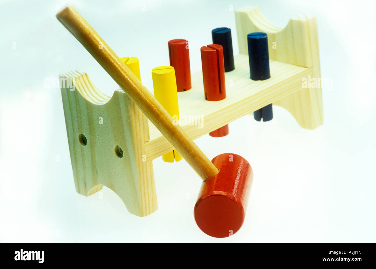 Round peg in round hole Stock Photo - Alamy