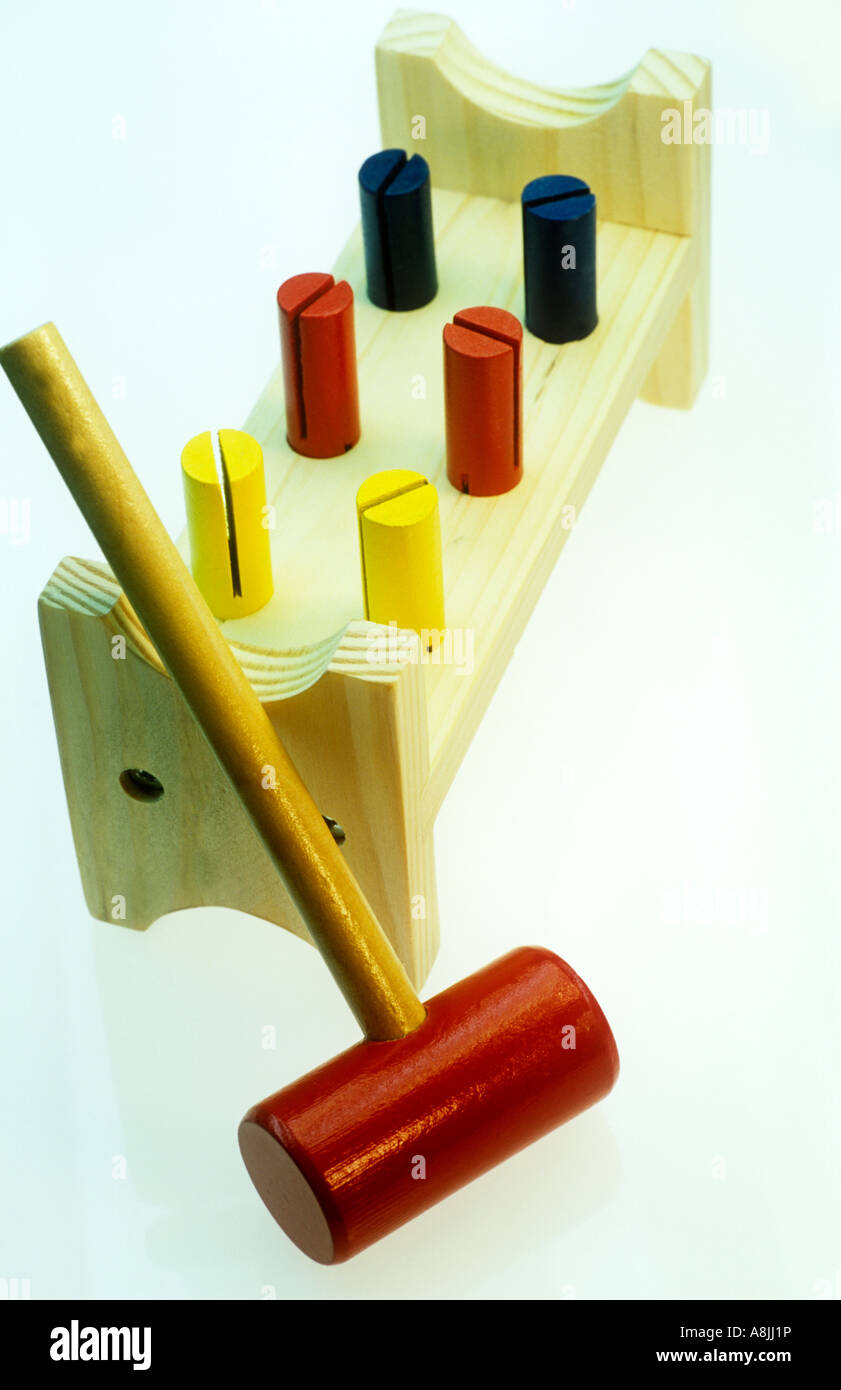 Round peg in round hole Stock Photo - Alamy