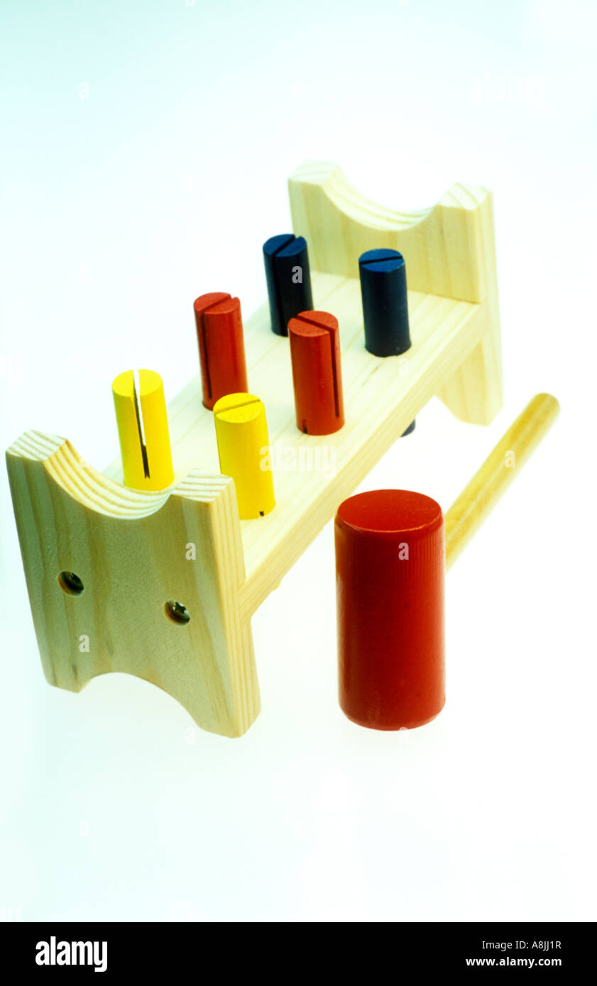 Round peg in round hole Stock Photo - Alamy