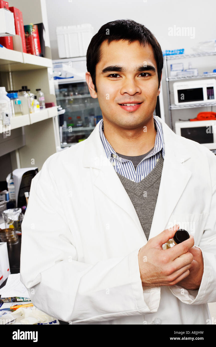 Portrait of a male pharmacist standing in a laboratory Stock Photo - Alamy