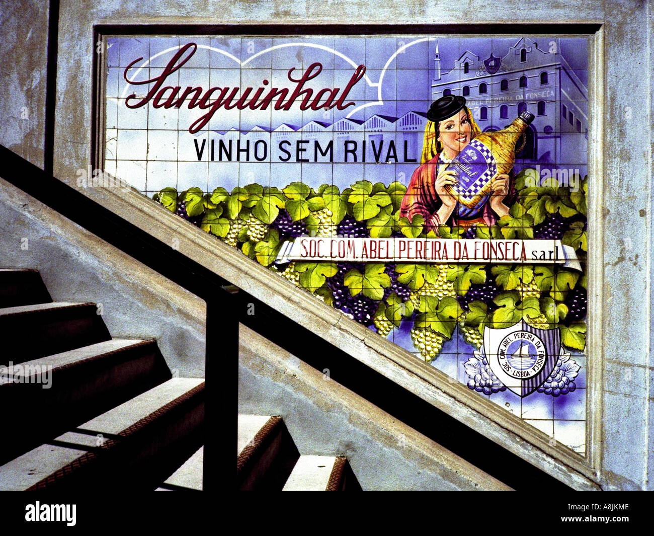 Tiled ceramic advertisement on stairway in Oporto Stock Photo - Alamy