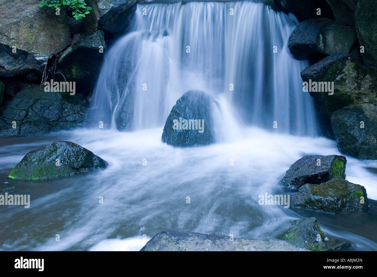 Water falling on the rock Stock Photo - Alamy