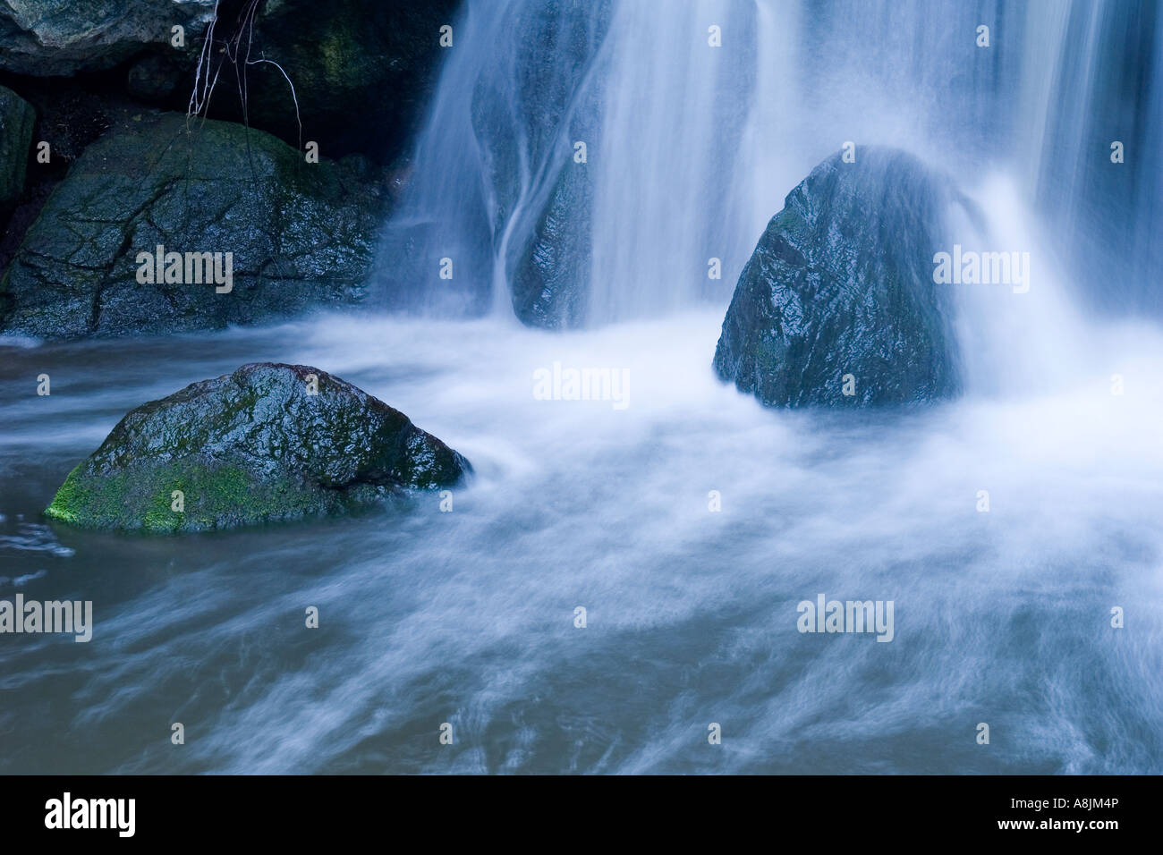 Water falling on the rock Stock Photo - Alamy
